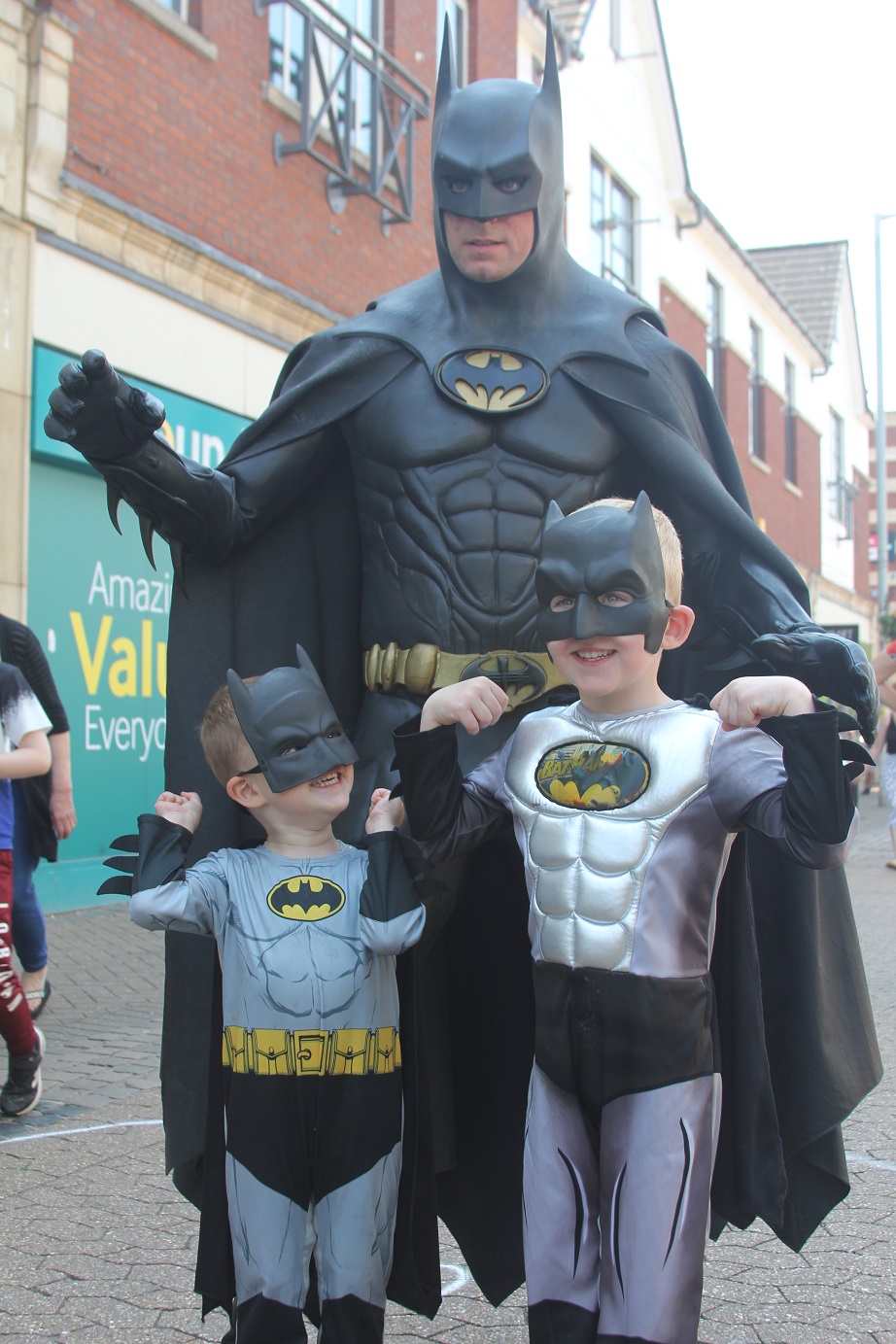 Crowds turn out to meet the Caped Crusader as Batman swoops into Sutton ...