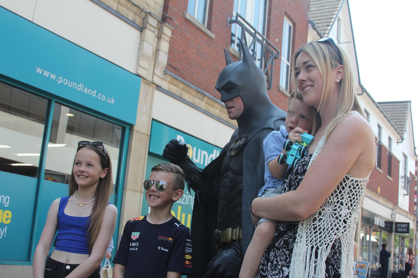 Crowds turn out to meet the Caped Crusader as Batman swoops into Sutton ...