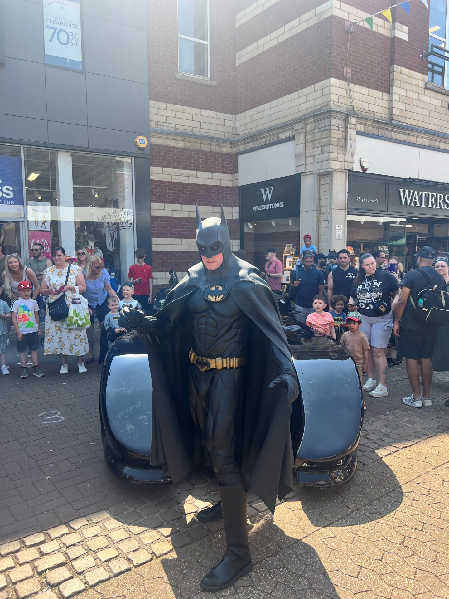 Crowds turn out to meet the Caped Crusader as Batman swoops into Sutton ...